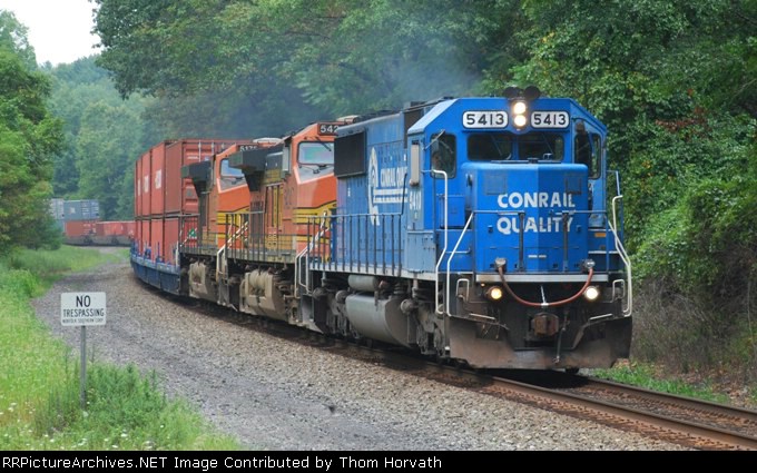 NS 20G takes its intermodal consist thru the "S" curves